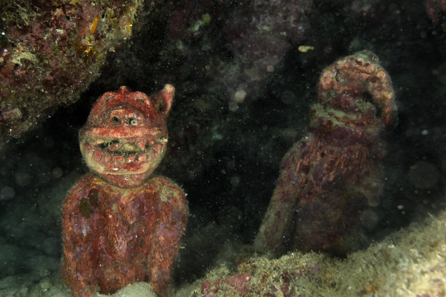 Shisa Dogs in an underwater cave, Sunabe Seawall-Chatan, Okinawa ...