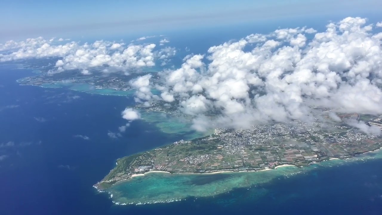 Take off from Naha, Okinawa and flyover of Tokyo. Okinawa’s coast and ...